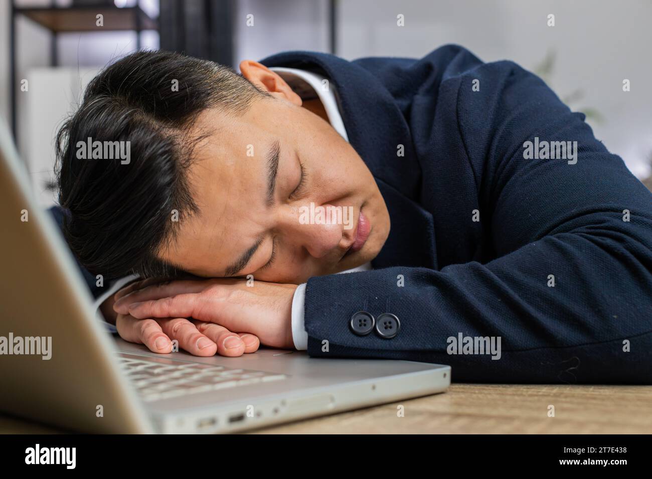 Middle aged businessman falling asleep hi-res stock photography and ...