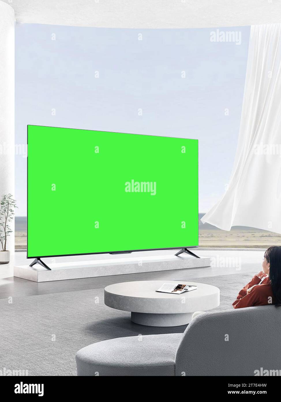 People are watching and enjoying next to the TV, monitor with green ...