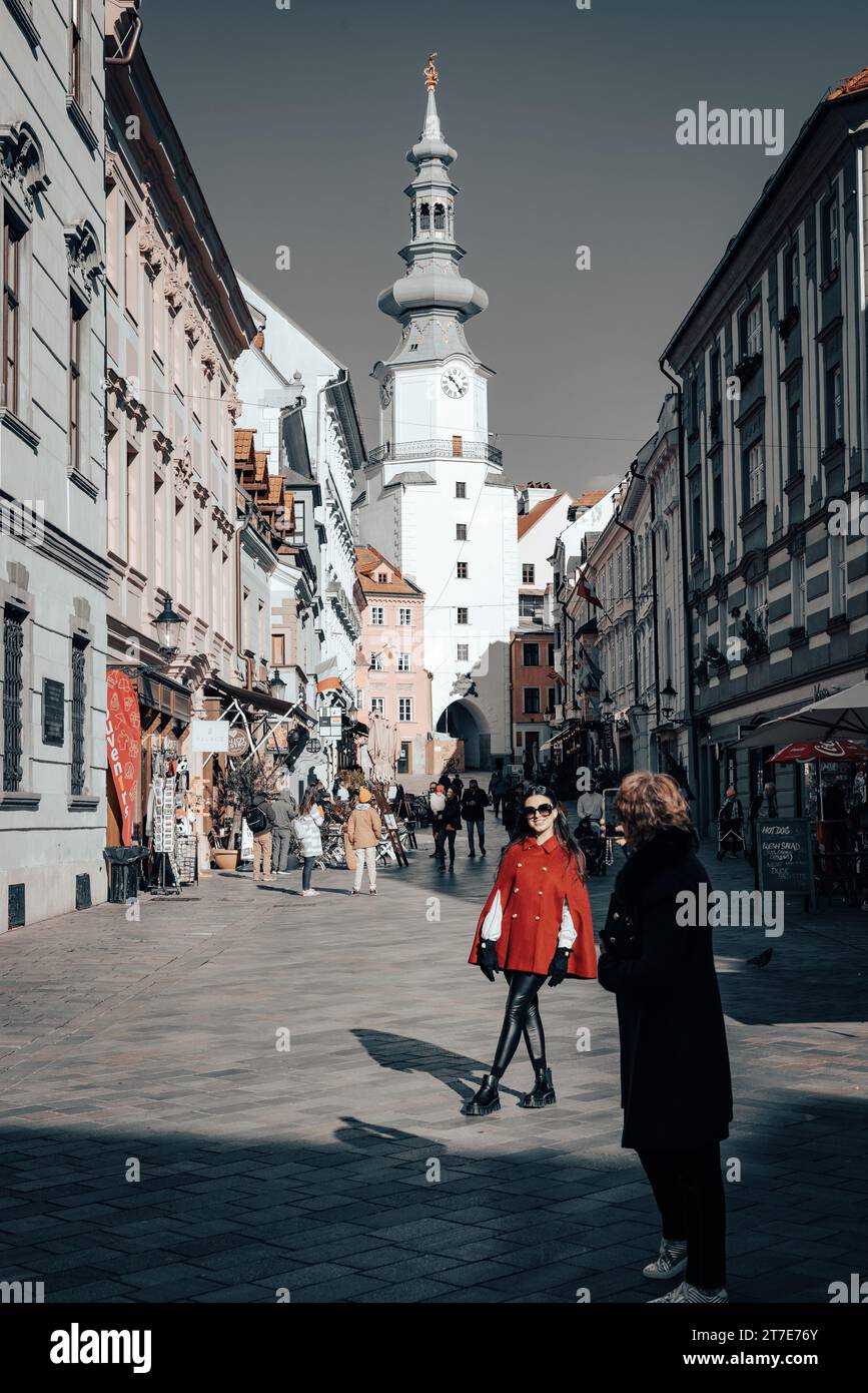 Tourits on Michalska Street in Bratislava, Slovakia, taking picture on ...