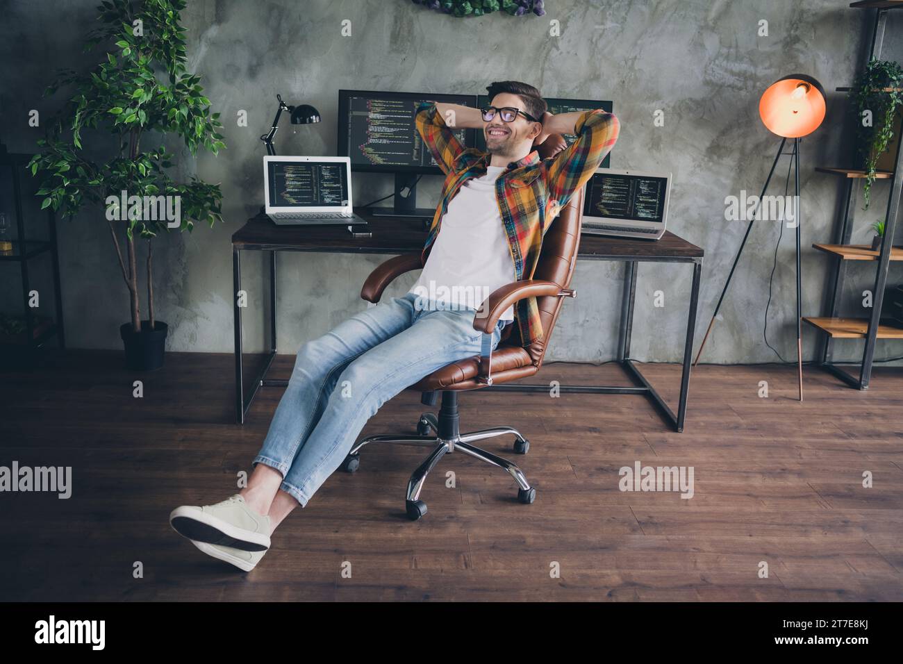 Full size photo of satisfied positive front end developer sit chair ...