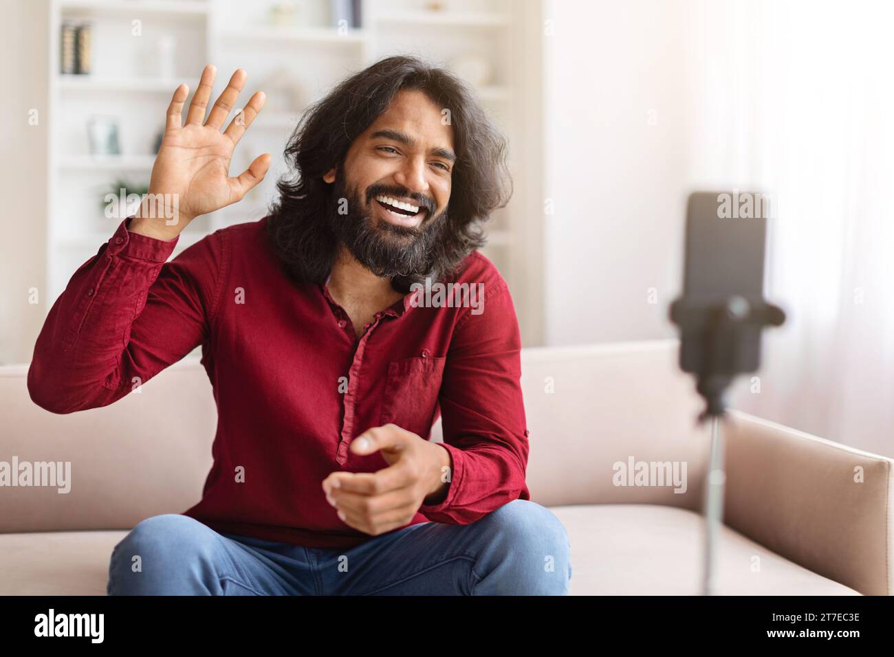 Man smiling streaming in live hi-res stock photography and images - Alamy