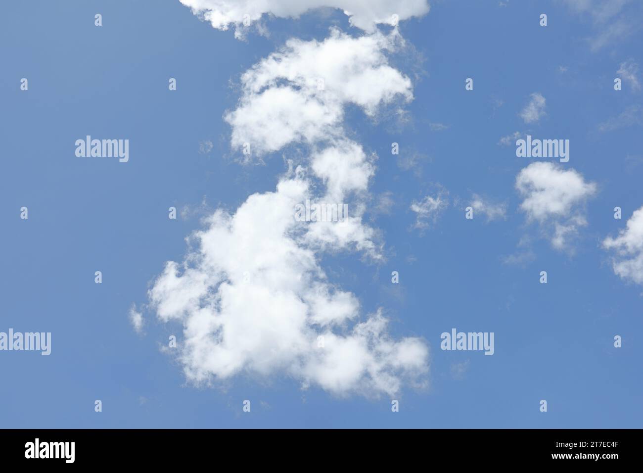 Fluffy white clouds in the blue sky, beautiful cumulus clouds against the blue sky background ...