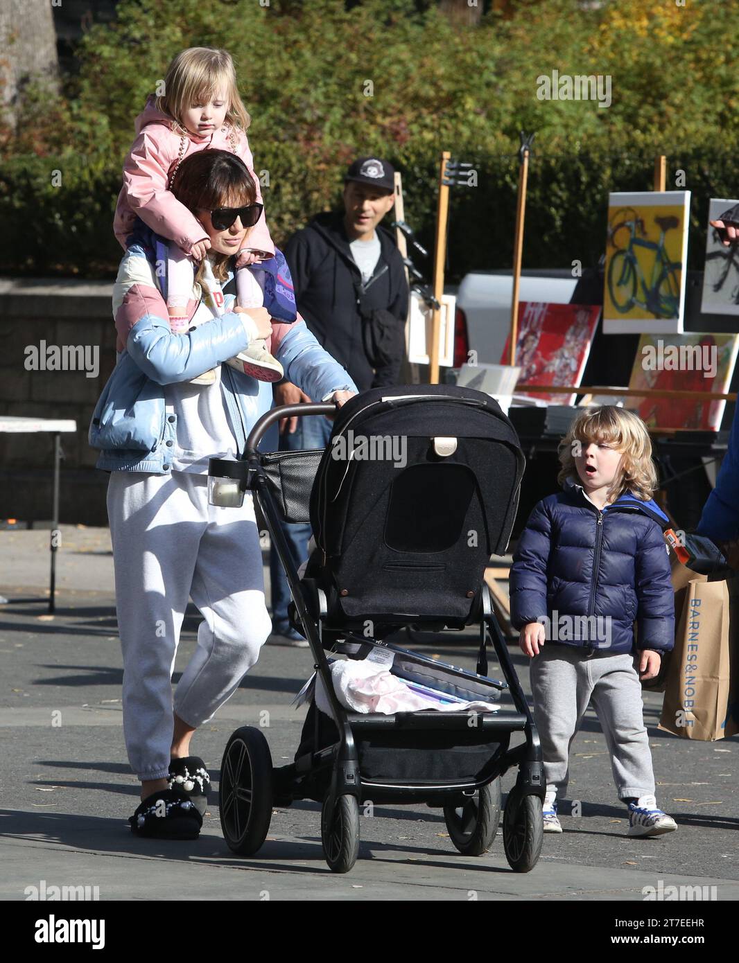 Hilaria Baldwin (wearing an "Empathy always' sweatshirt) out with 4 of ...