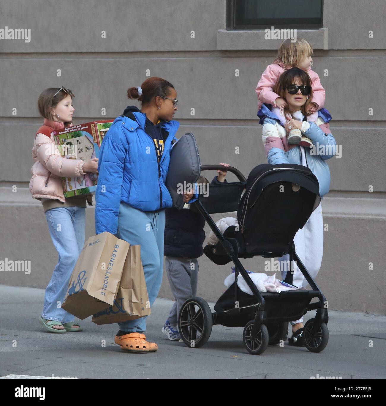 Hilaria Baldwin (wearing an "Empathy always' sweatshirt) out with 4 of ...
