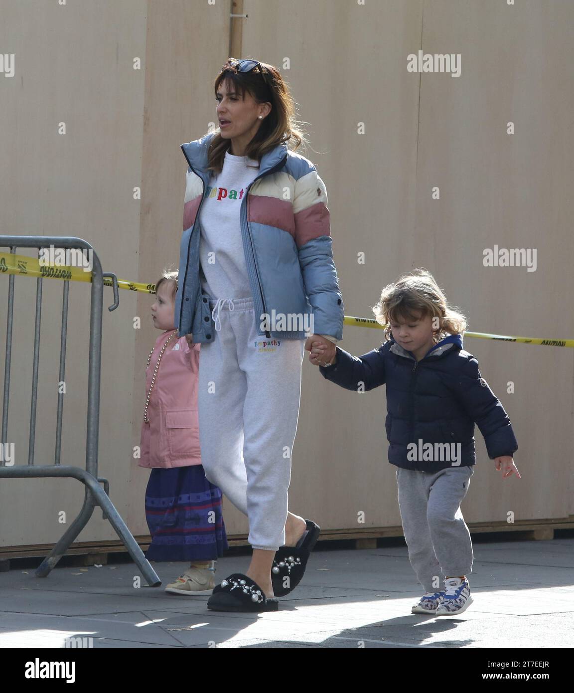 Hilaria Baldwin (wearing an "Empathy always' sweatshirt) out with 4 of ...