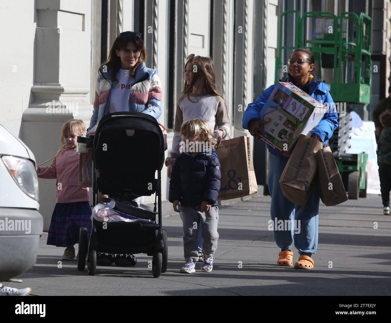 Hilaria Baldwin (wearing an "Empathy always' sweatshirt) out with 4 of ...
