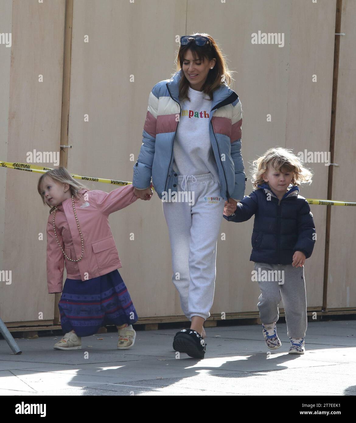 Hilaria Baldwin (wearing an "Empathy always' sweatshirt) out with 4 of ...