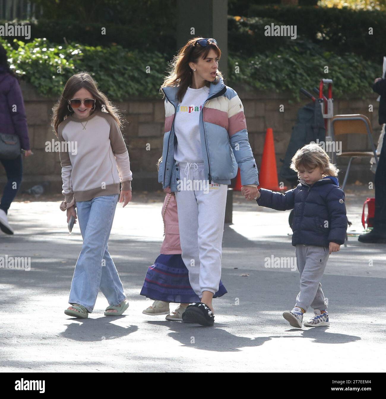 Hilaria Baldwin (wearing an "Empathy always' sweatshirt) out with 4 of ...