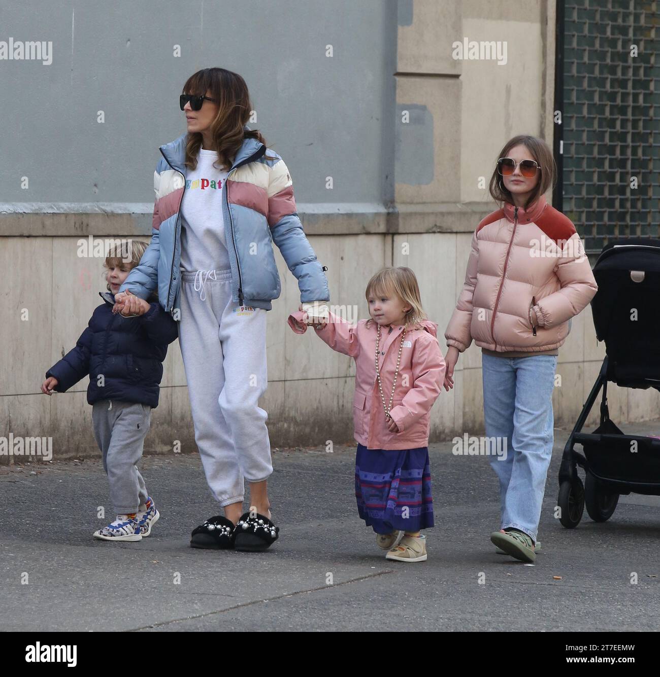 Hilaria Baldwin (wearing an "Empathy always' sweatshirt) out with 4 of ...