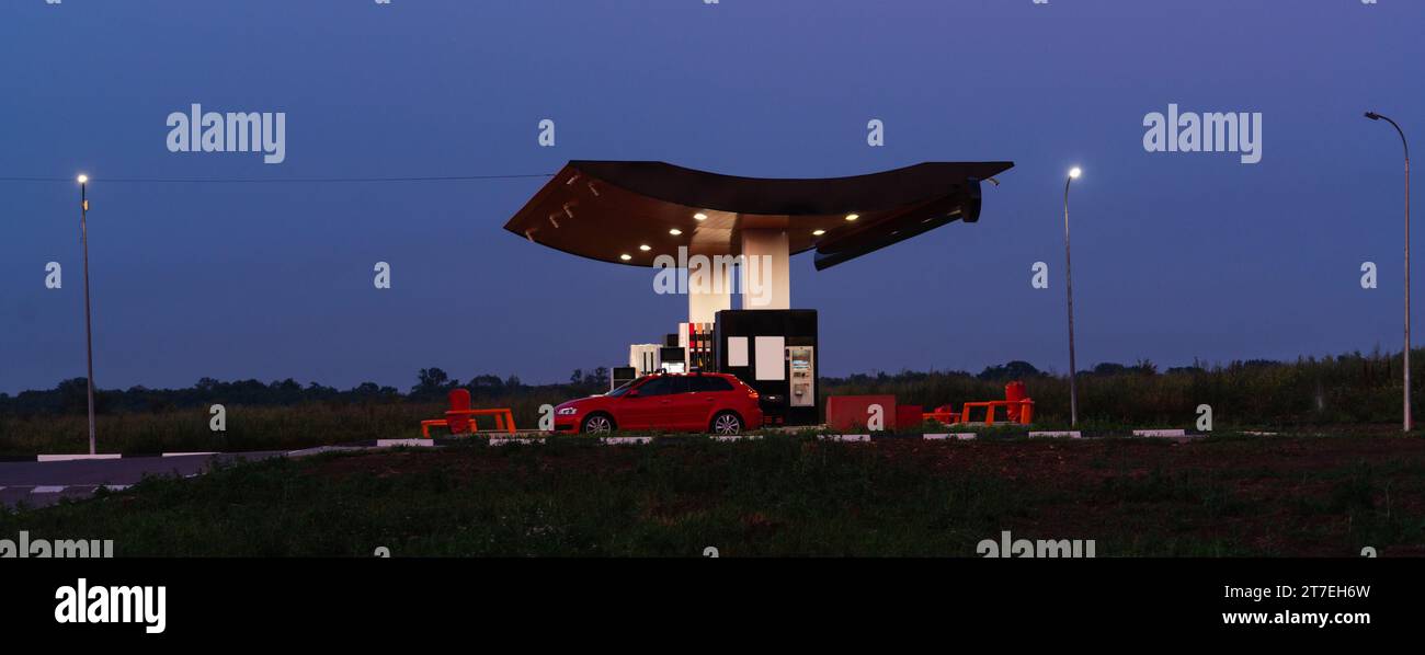 Modern self service gas station at night Stock Photo - Alamy