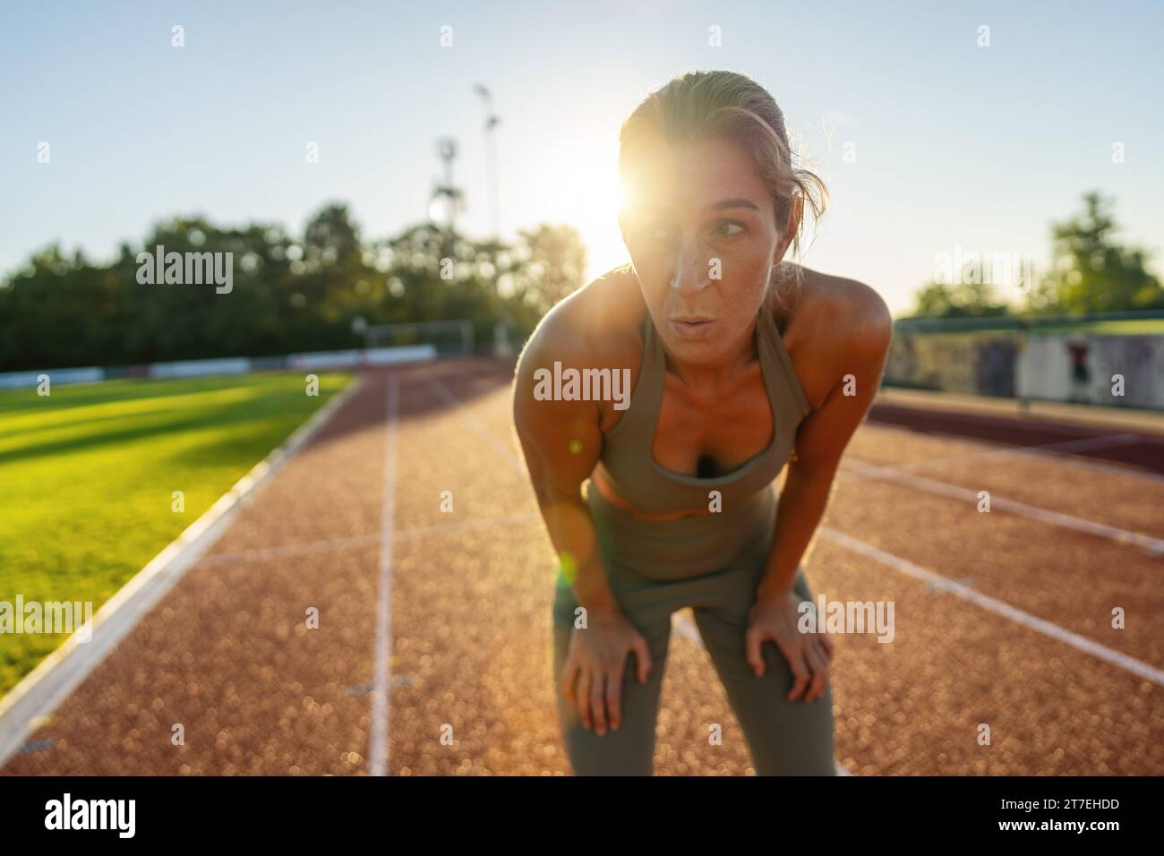 Woman competition track resting hi-res stock photography and images - Alamy