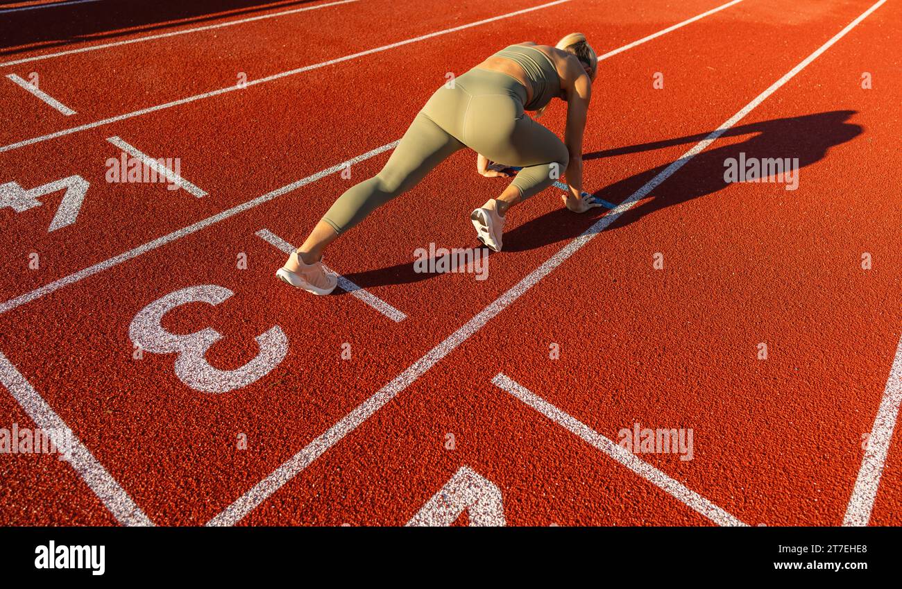 Female sprinter starting block hi-res stock photography and images - Alamy
