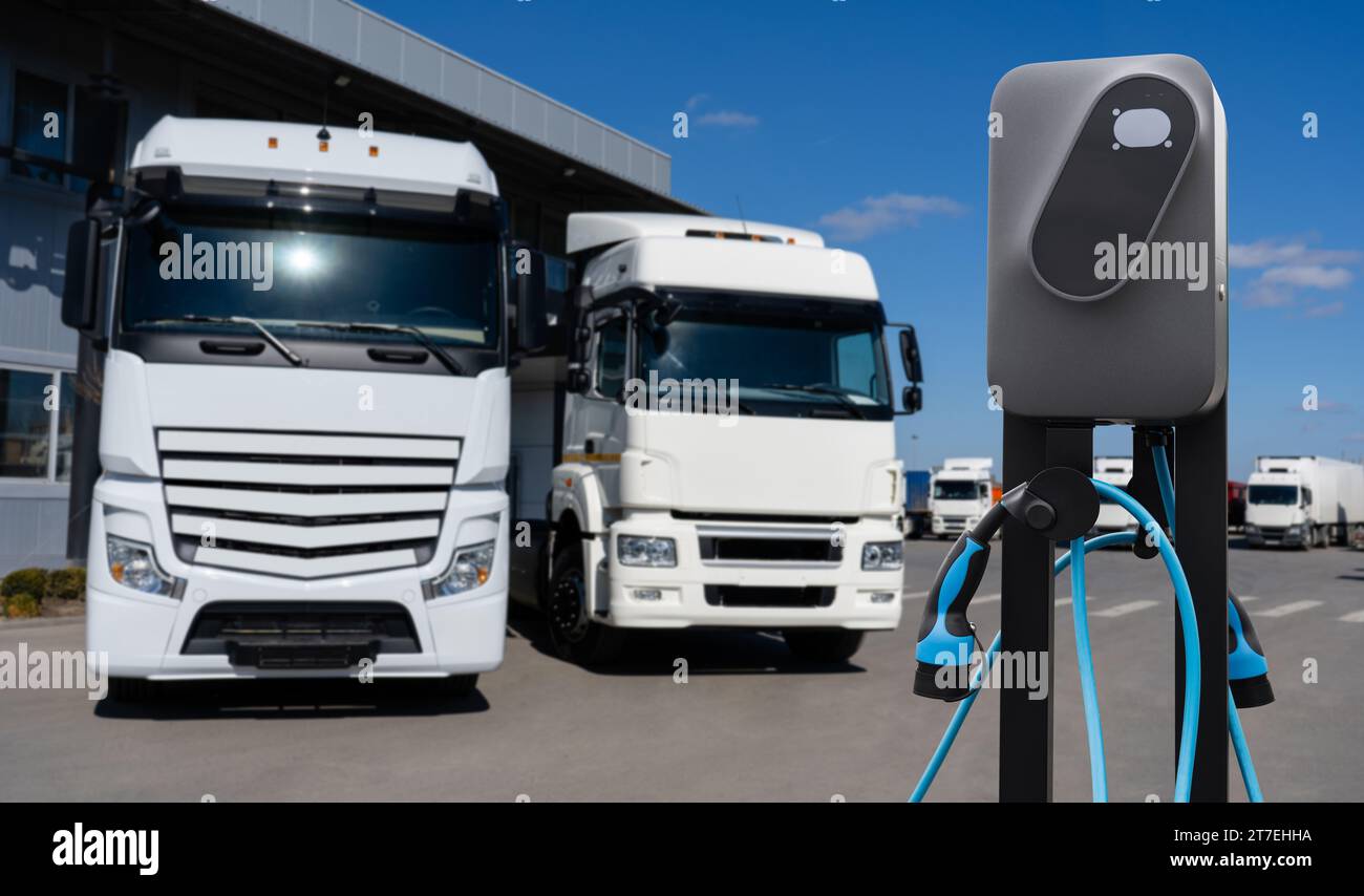 Semi truck fleet at the logistics center Stock Photo - Alamy