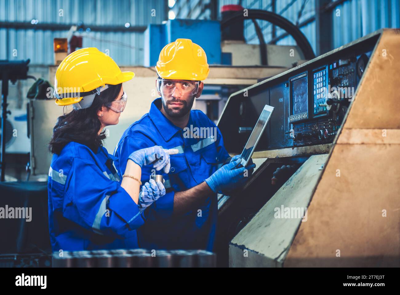 Portrait of Heavy industry workers working on the metal fabrication ...