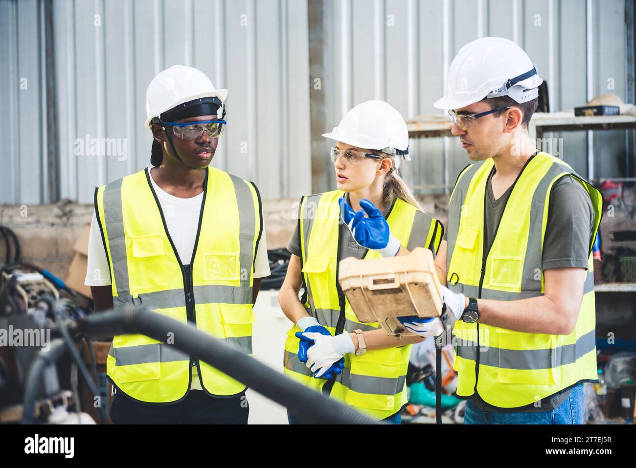Engineers team mechanic using computer controller Robotic arm for ...
