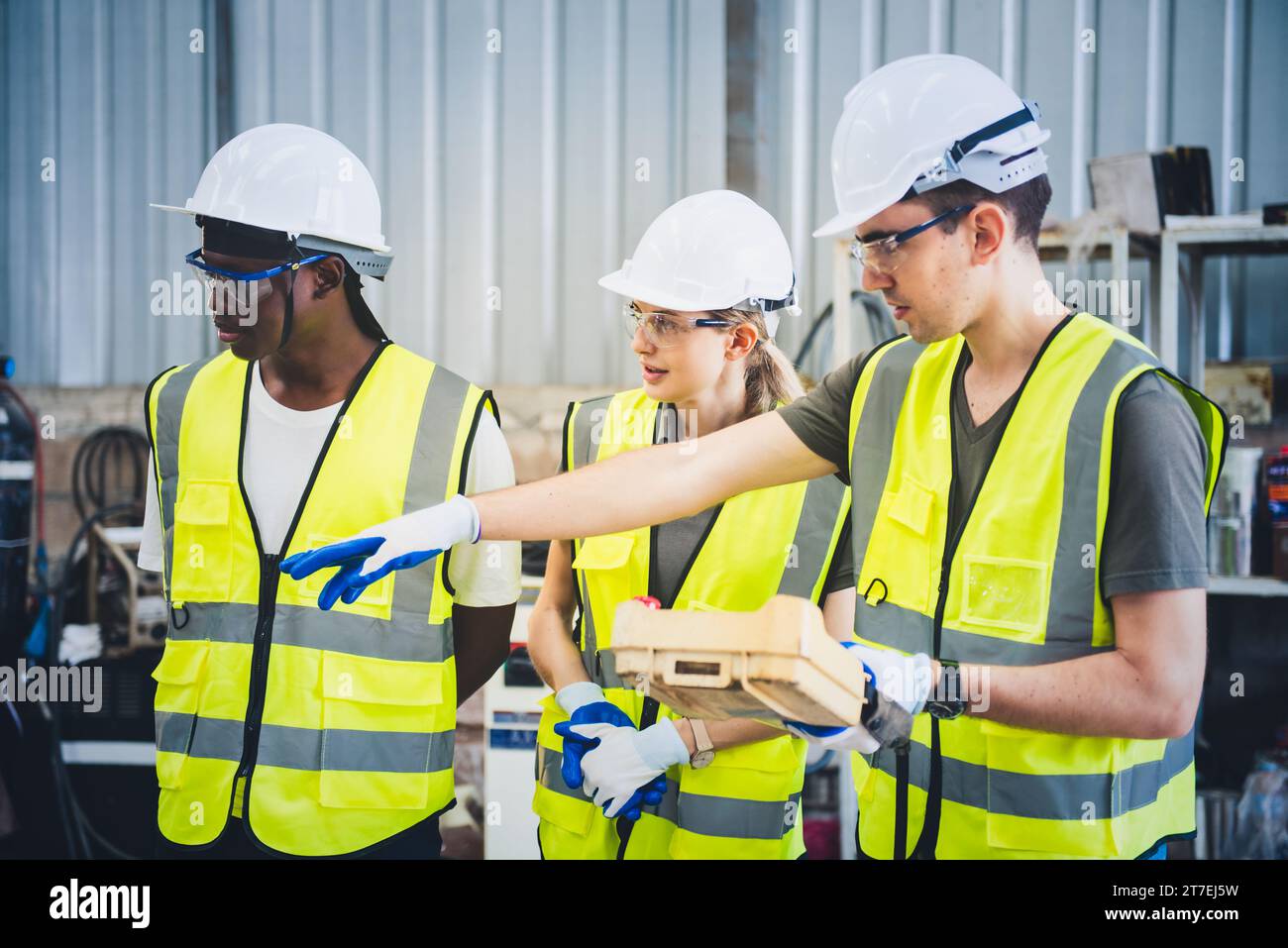 Engineers team mechanic using computer controller Robotic arm for ...