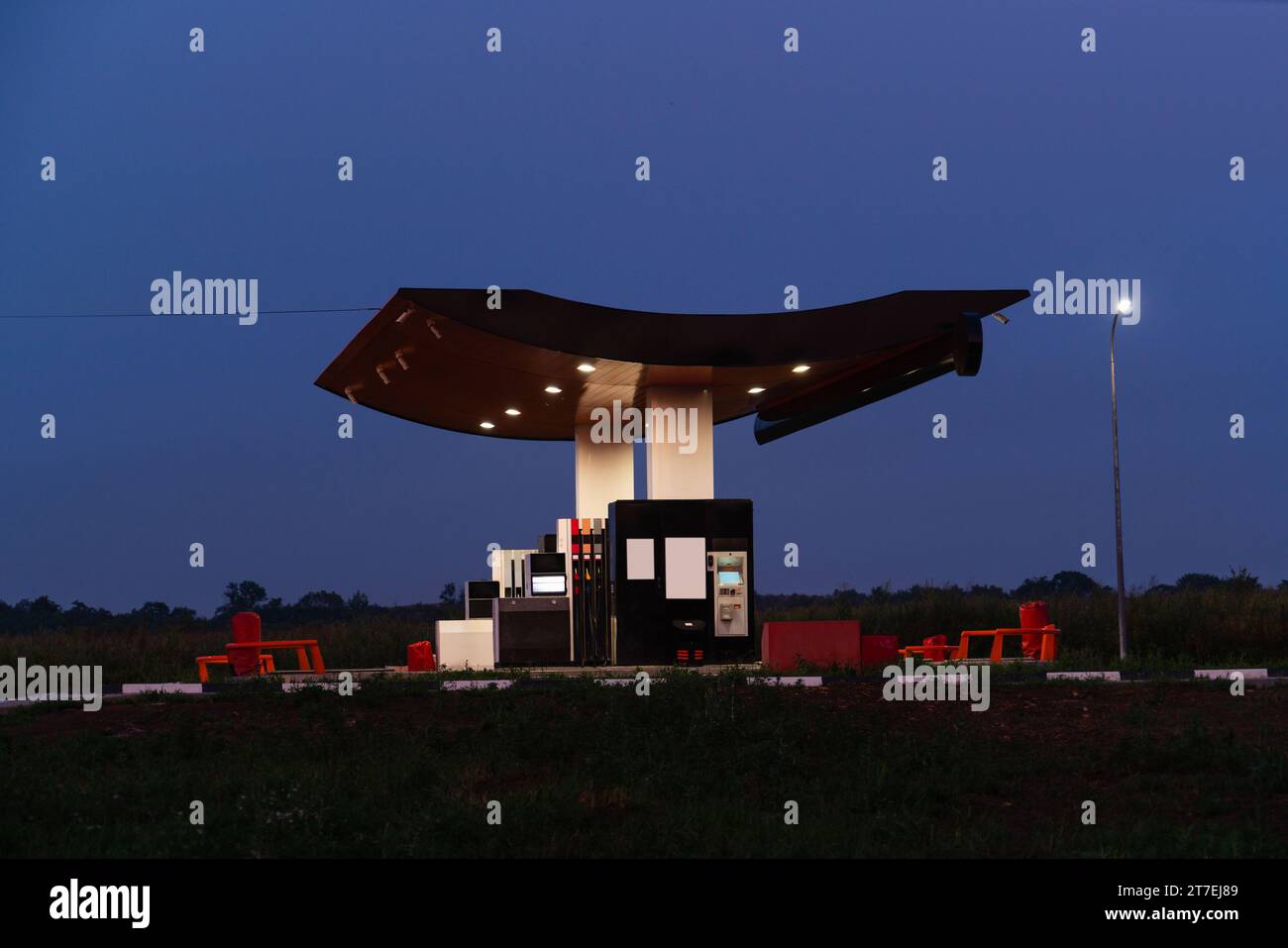 Modern self service gas station at night Stock Photo - Alamy