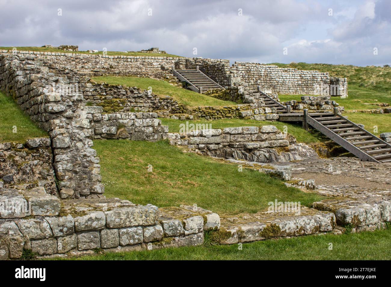 Looking out over the ruins of the barracks at Housestead fort, a Roman ...