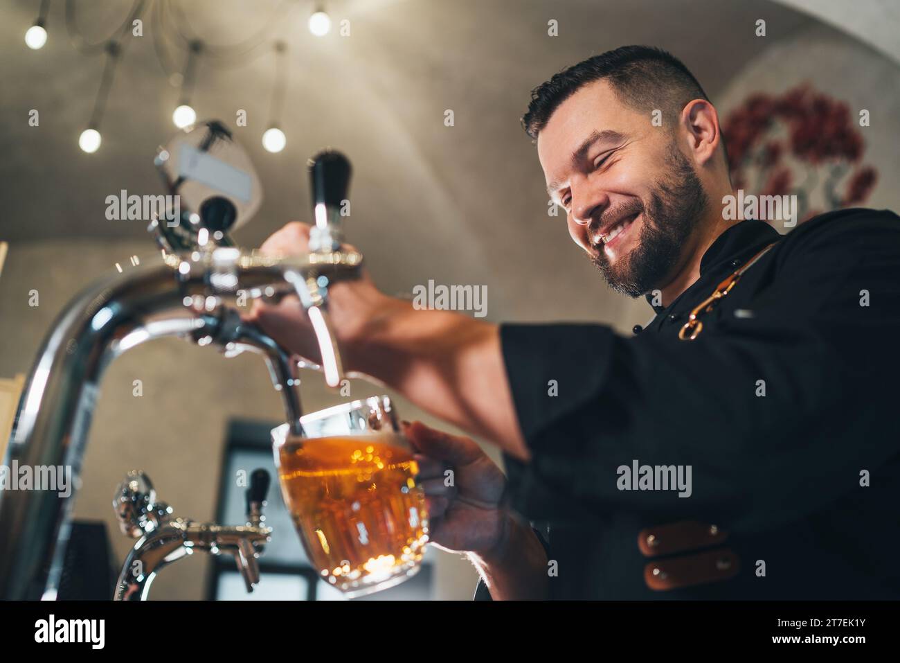Draft beer tapping hi-res stock photography and images - Alamy