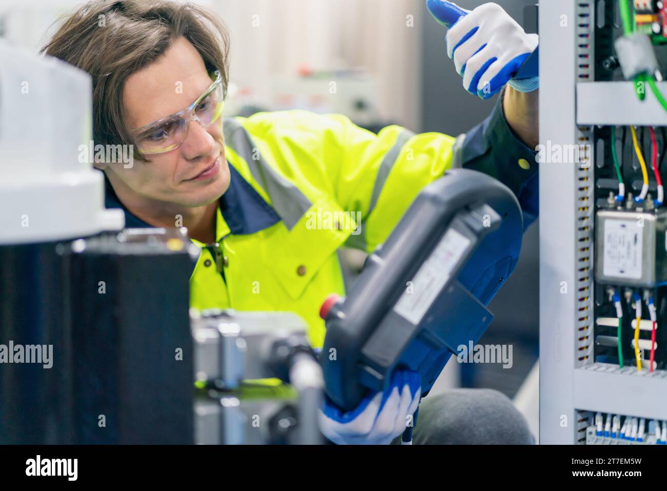 Electrical engineer work tester measuring voltage and current of power ...