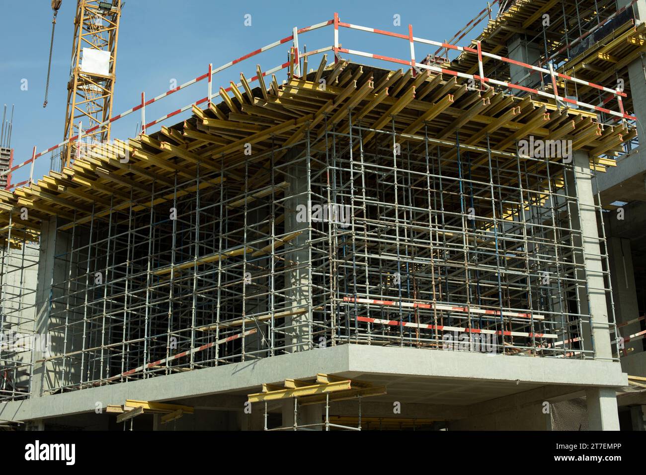 Building. Concrete and steel construction. Erection of walls of house ...