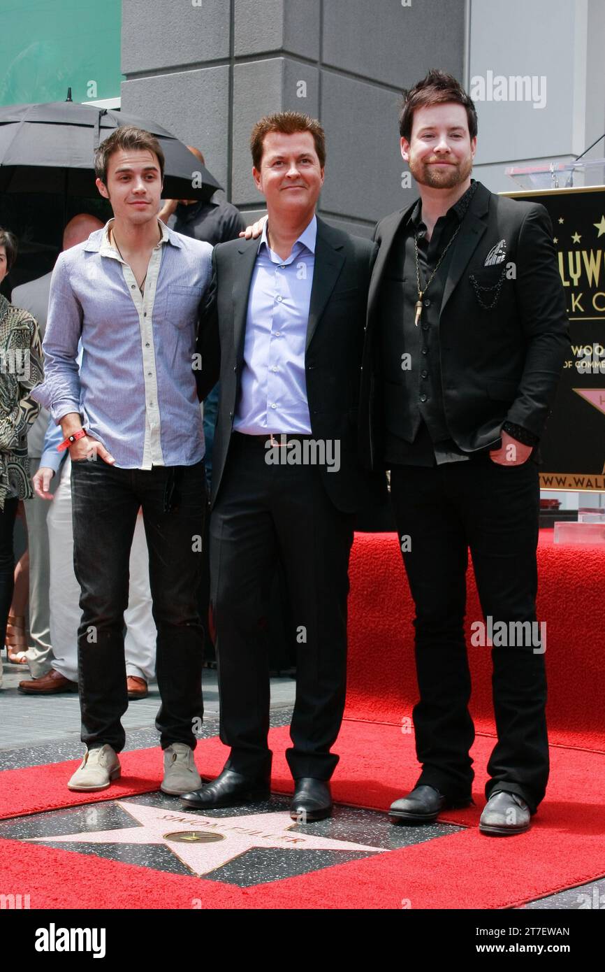 Simon Fuller with Kris Allen and David Cook at the Hollywood Chamber of ...