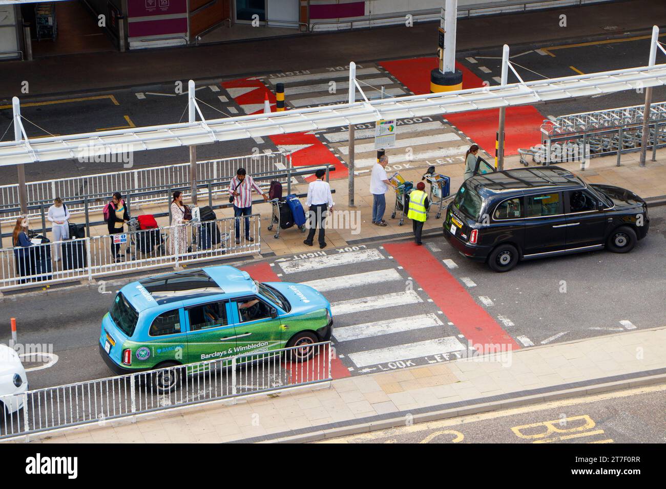high view of passenger queuing in line for taxis cabs at london ...