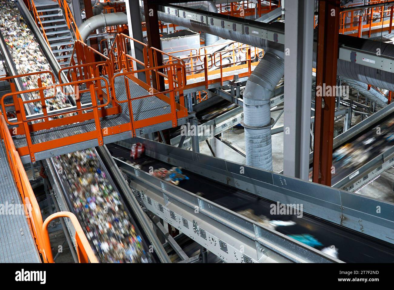 Plastic waste runs on conveyor belts at a new plastic waste sorting ...