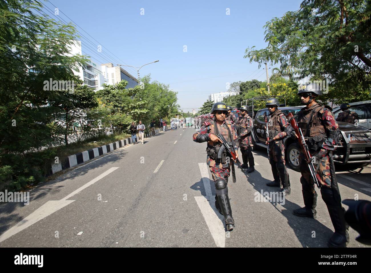 Border Guard Bangladesh (BGB) members stand guard in front of the ...
