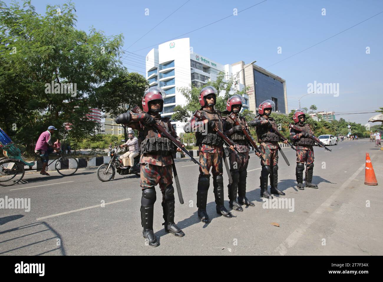 Border Guard Bangladesh (BGB) members stand guard in front of the ...