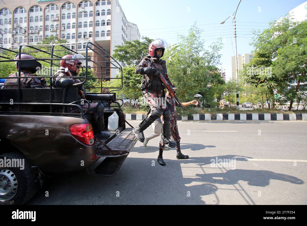 Border Guard Bangladesh (BGB) members stand guard in front of the ...