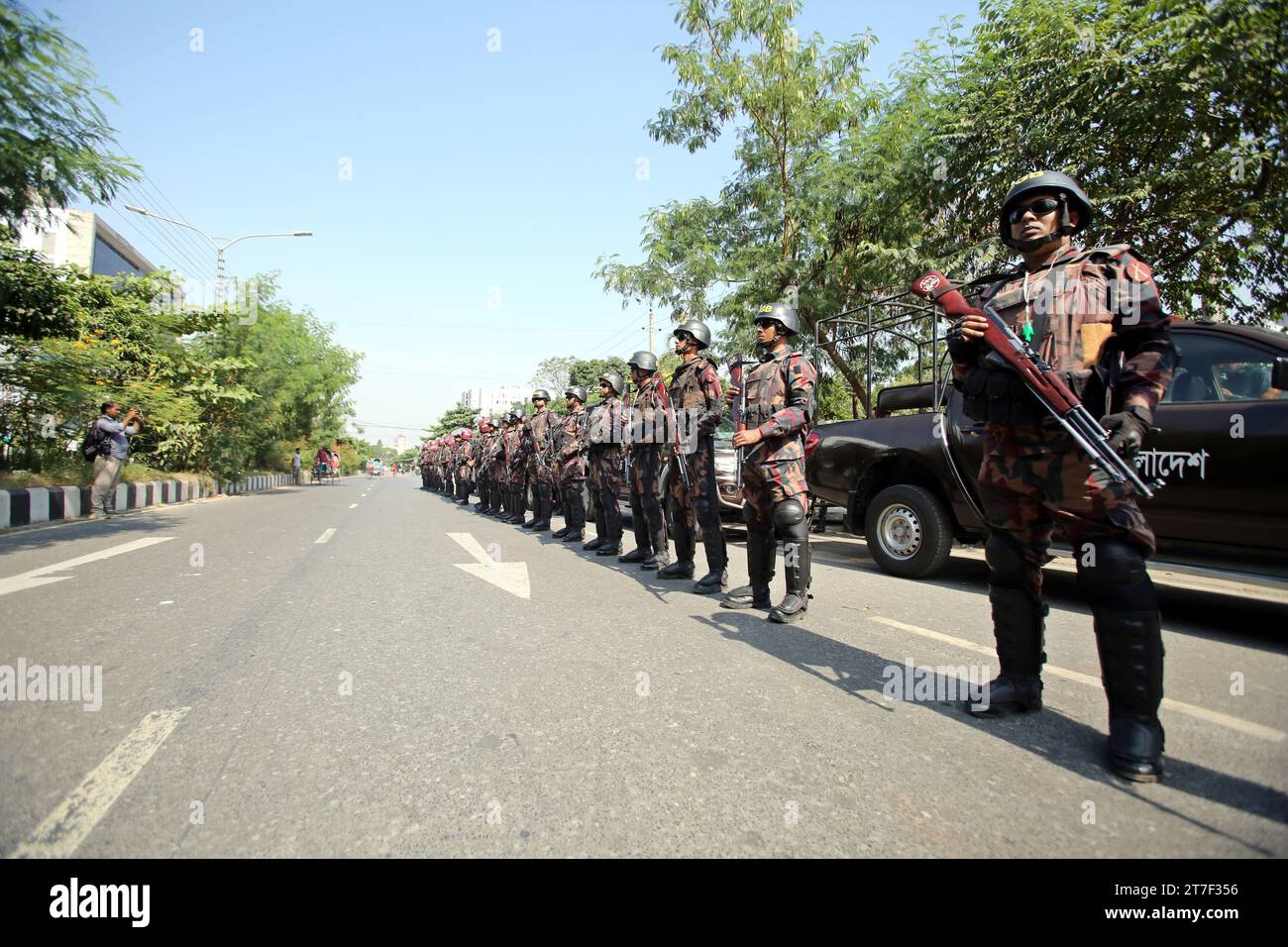 Border Guard Bangladesh (BGB) members stand guard in front of the ...