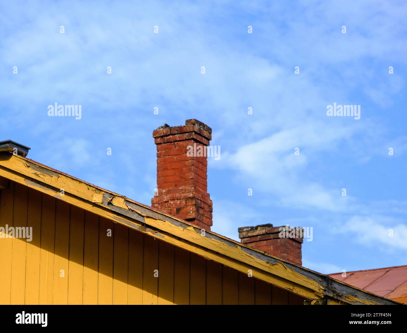 Two red brick chimneys hi-res stock photography and images - Alamy