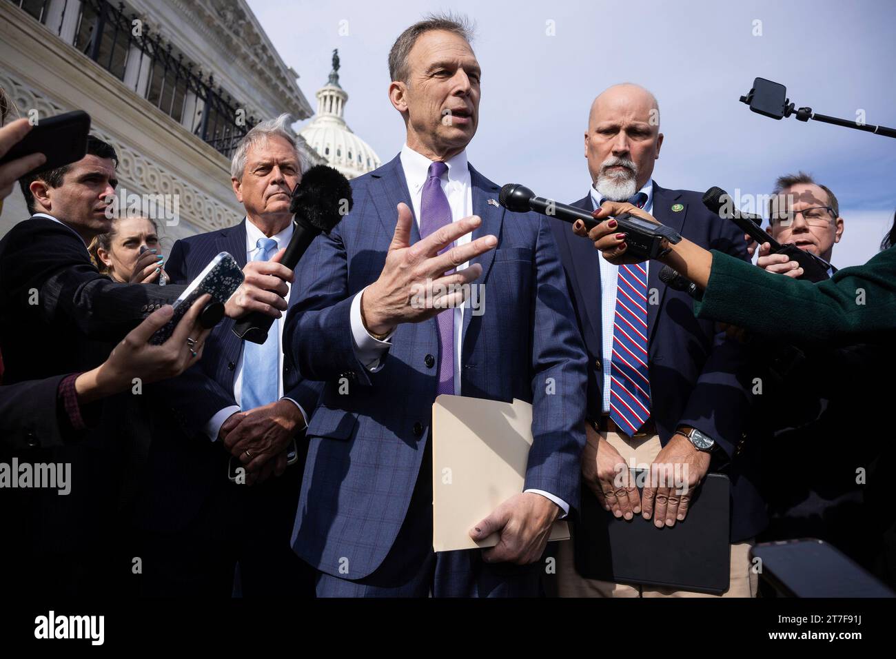 Rep. Scott Perry (R-Pa.), flanked by Reps. Ralph Norman (R-S.C.) and ...