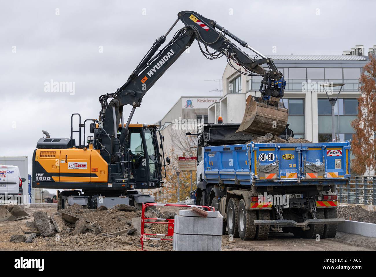 Nancy, France - Yellow and dark grey wheeled excavator Hyundai HW140A ...