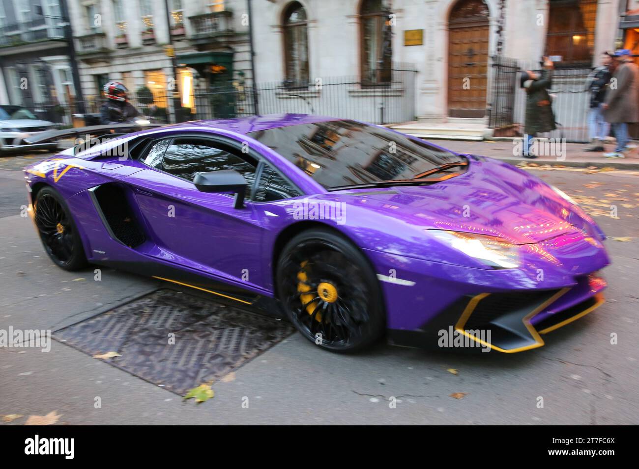 London, UK. 13th Nov, 2023. A purple coloured Lamborghini in London's ...