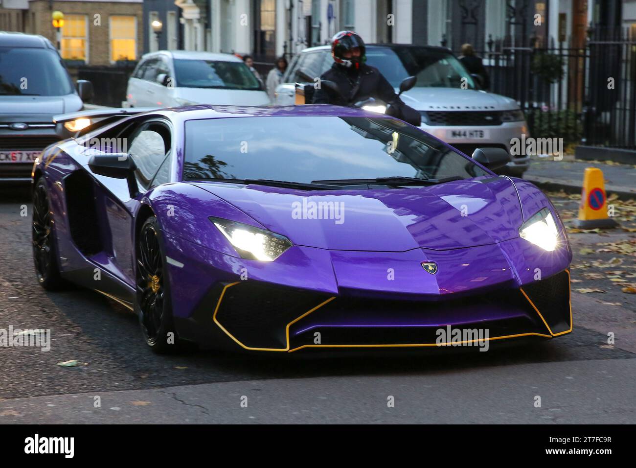 London, UK. 13th Nov, 2023. A purple coloured Lamborghini in London's ...