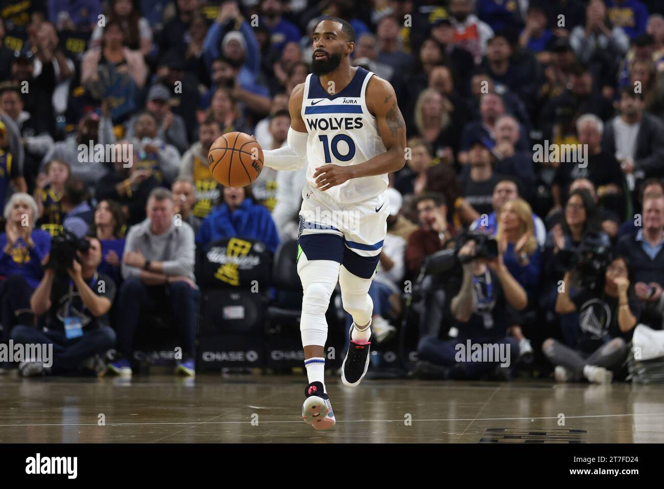 Minnesota Timberwolves guard Mike Conley (10) drives to the basket ...