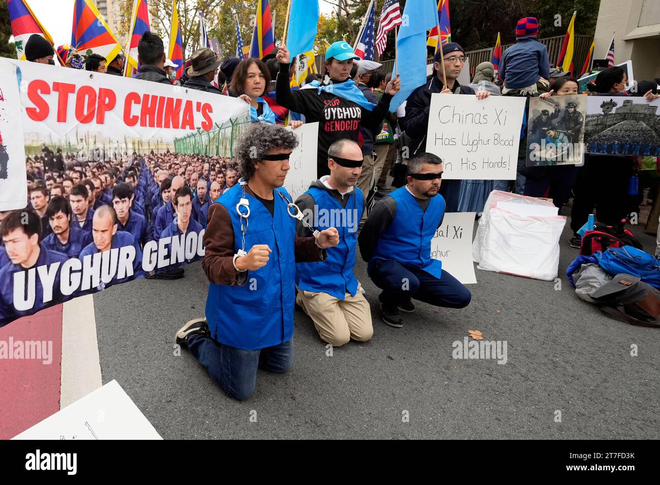 Demonstrators gather outside of the Chinese Consulate to protest the ...