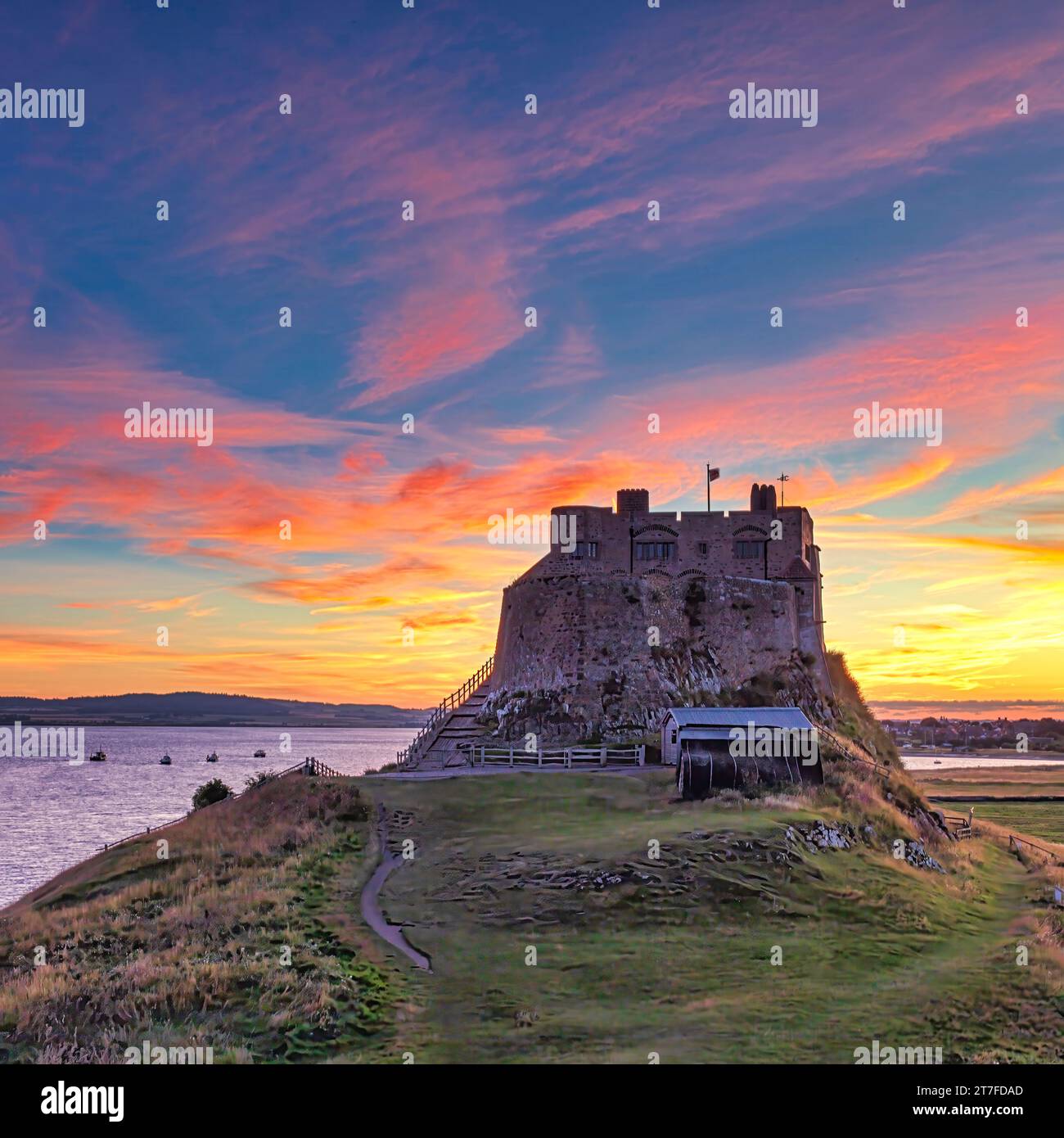 Summer sunset from Beblow Crag over Lindisfarne Castle on the Holy ...