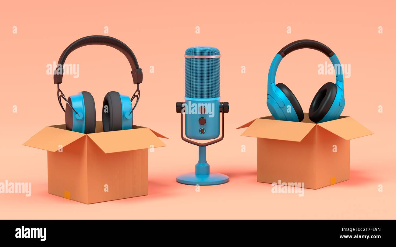 Set of gamer headphones and microphone in cardboard box on orange ...