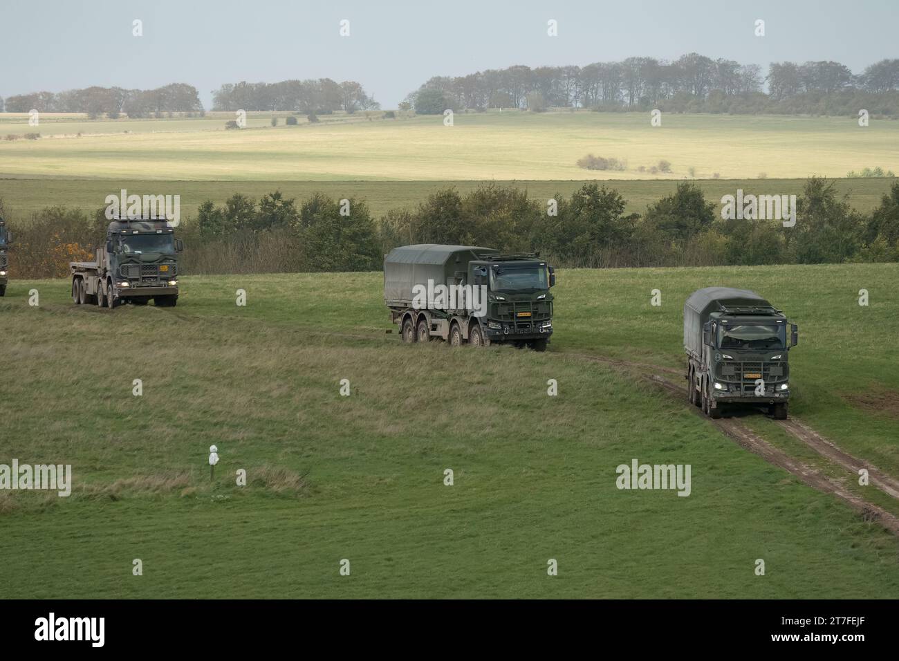 a convoy of Dutch (Netherlands) army Scania utility trucks in action on ...