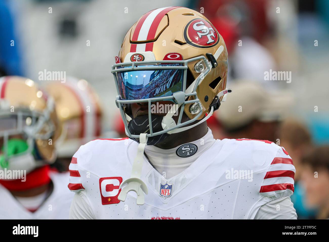 A reflection of the stadium is seen in the visor of San Francisco 49ers ...