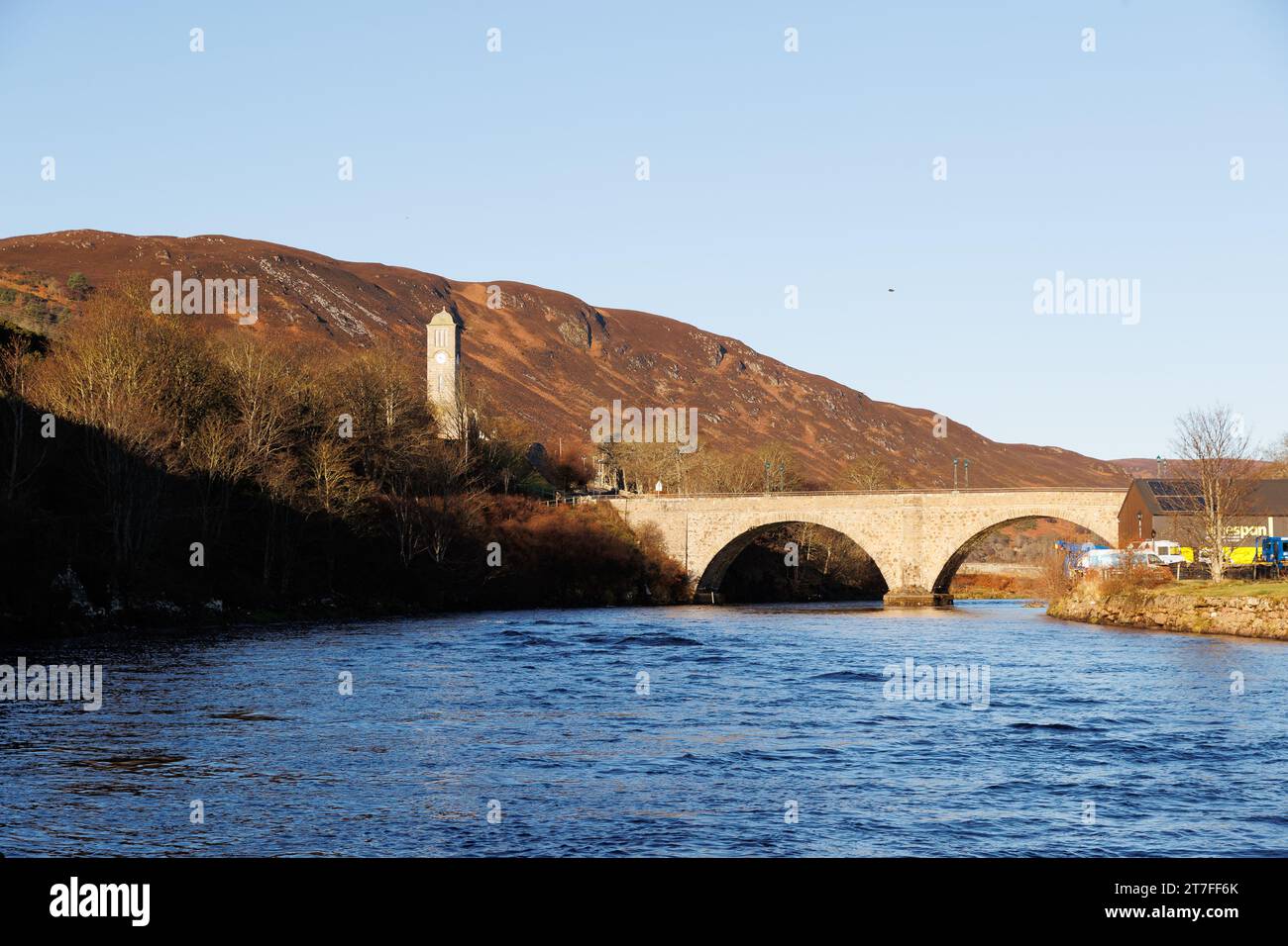 Helmsdale, Scotland. A double arched stone bridge crosses the River ...