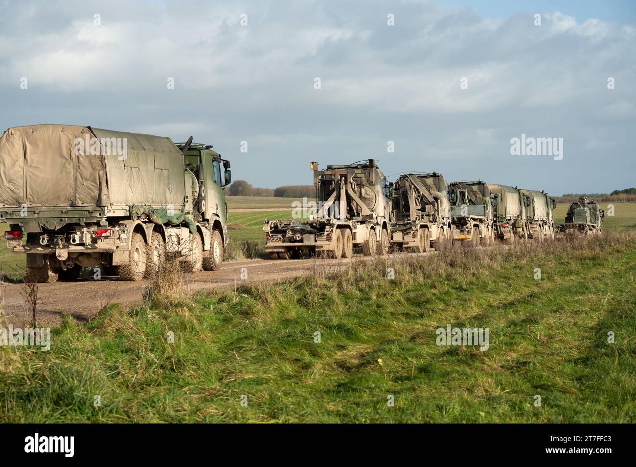 a convoy of Dutch (Netherlands) army Scania utility trucks in action on ...