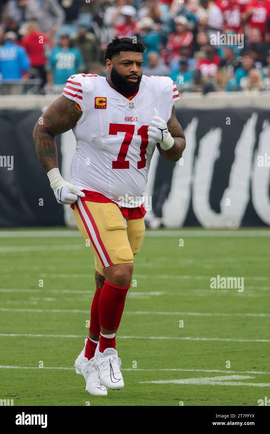 San Francisco 49ers offensive tackle Trent Williams (71) trots off the ...