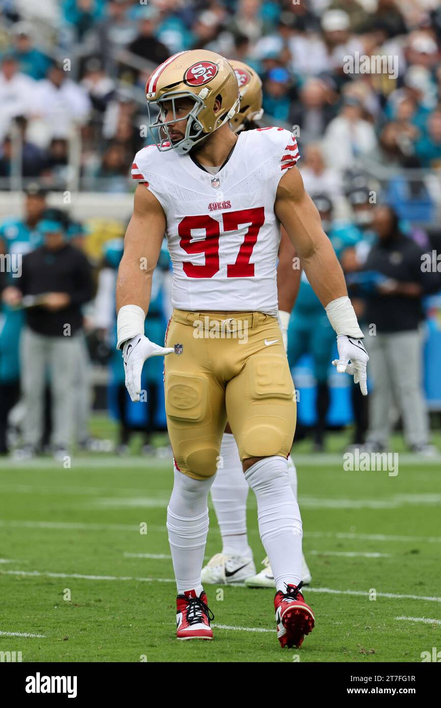 San Francisco 49ers defensive end Nick Bosa (97) walks down the line of ...