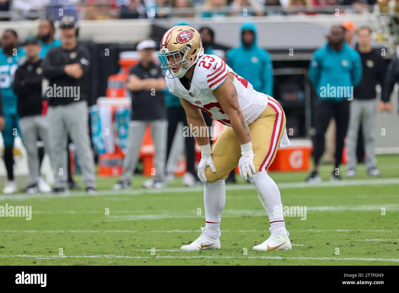 San Francisco 49ers running back Christian McCaffrey (23) sets himself ...
