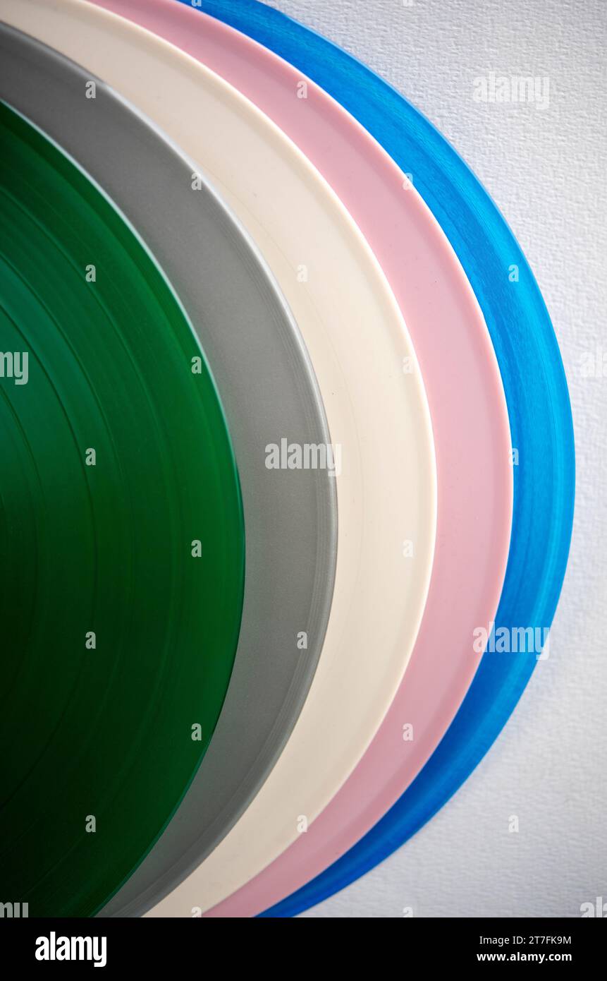 A collection of different coloured vinyl records Stock Photo - Alamy