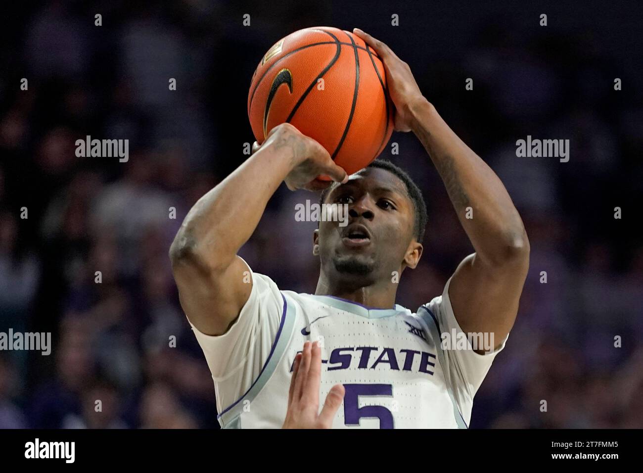 Kansas State guard Cam Carter shoots during the second half of an NCAA ...